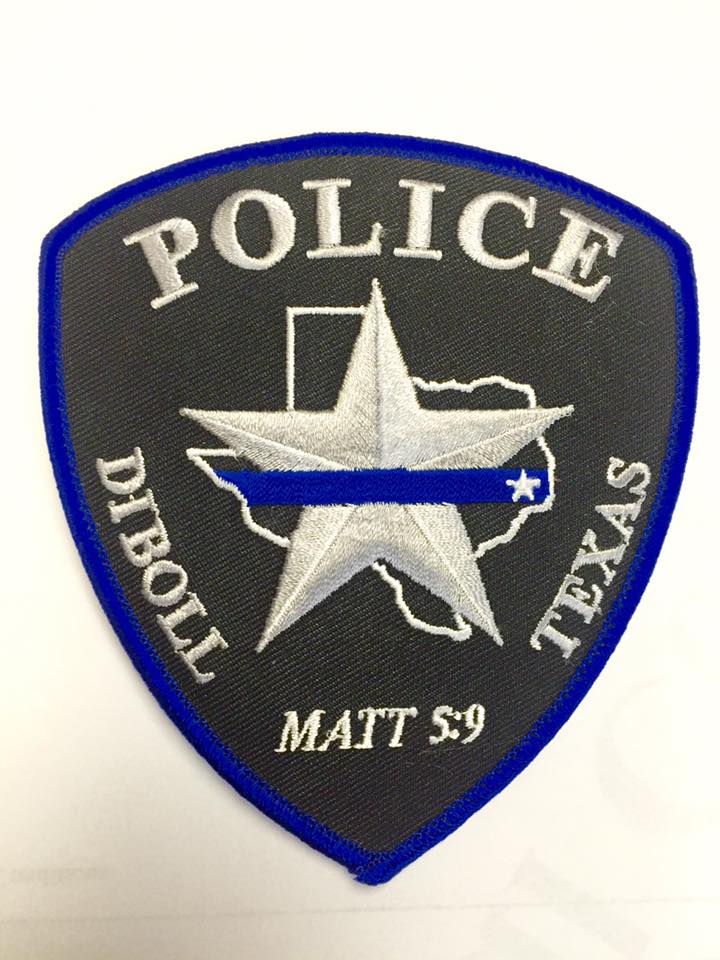 Police Patch With Scripture Nixed - Law Officer